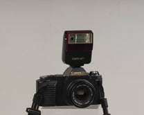 Canon T50 35mm film SLR camera w/50mm f1.8 lens + Speedlite flash (ser ...